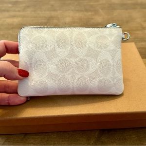 Coach | Bags | Coach Corner Zip Wristlet In Signature Canvas In Silver ...